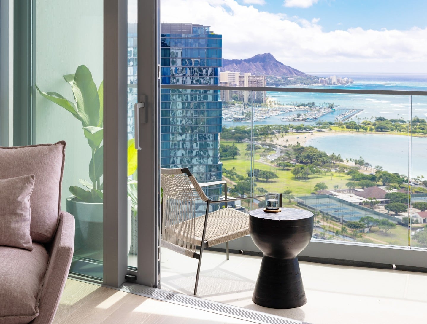 At Kōʻula, living areas are illuminated by natural light and floor-to ...